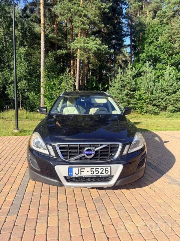 Black Volvo XC60 2013 in Riga, with an engine capacity of 2.40 L and mileage of 257 thousand km for 11300 €, photo 5 on AUTOMOTO.COM.LV