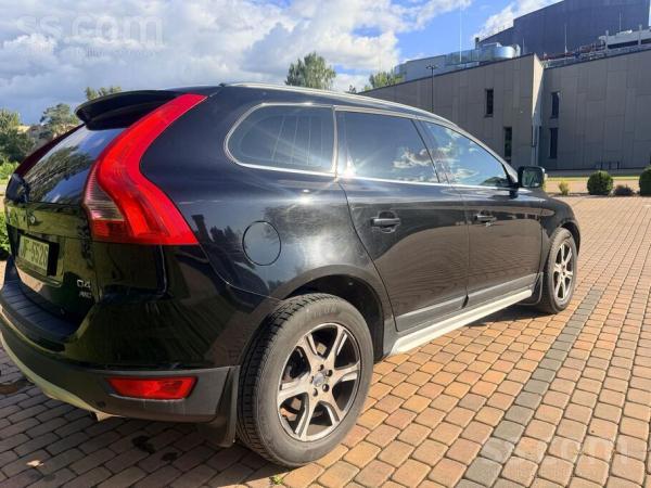 Black Volvo XC60 2013 in Riga, with an engine capacity of 2.40 L and mileage of 257 thousand km for 11300 €, photo 6 on AUTOMOTO.COM.LV