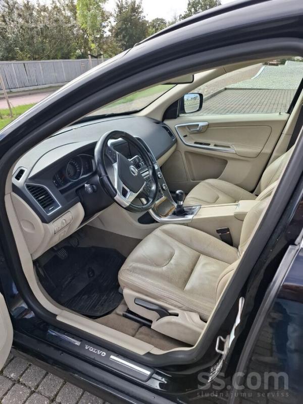Black Volvo XC60 2013 in Ventspils, with an engine capacity of 2.40 L and mileage of 0 thousand km for 8500 €, photo 6 on AUTOMOTO.COM.LV
