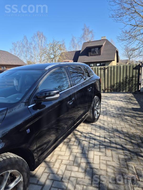 Black Volvo XC60 2014 in Riga, with an engine capacity of 2.00 L and mileage of 182 thousand km for 6990 €, photo 10 on AUTOMOTO.COM.LV