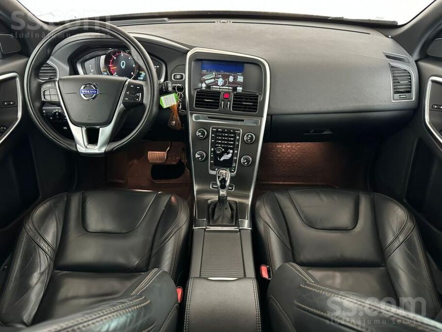 Black Volvo XC60 2014 in Riga, with an engine capacity of 2.40 L and mileage of 240 thousand km for 14190 €, photo 10 on AUTOMOTO.COM.LV