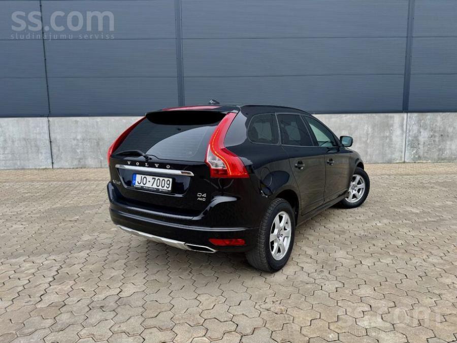Black Volvo XC60 2014 in Riga, with an engine capacity of 2.40 L and mileage of 212 thousand km for 11300 €, photo 4 on AUTOMOTO.COM.LV