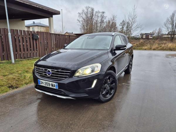 Black Volvo XC60 2014 in Vilnius, with an engine capacity of 2.40 L and mileage of 220 thousand km for 13800 €, photo 3 on AUTOMOTO.COM.LV