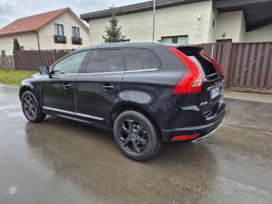 Black Volvo XC60 2014 in Vilnius, with an engine capacity of 2.40 L and mileage of 220 thousand km for 13800 €, photo 6 on AUTOMOTO.COM.LV