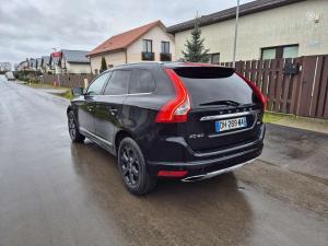 Black Volvo XC60 2014 in Vilnius, with an engine capacity of 2.40 L and mileage of 220 thousand km for 13800 €, photo 7 on AUTOMOTO.COM.LV