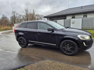 Black Volvo XC60 2014 in Vilnius, with an engine capacity of 2.40 L and mileage of 220 thousand km for 13800 €, photo 13 on AUTOMOTO.COM.LV