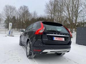 Melns Volvo XC60 2014 Alīta, ar dzinēja tilpumu 1.98 L un nobraukumu 280 tūkst. km par 12450 €, foto 10 vietnē AUTOMOTO.COM.LV
