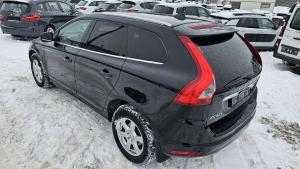 Black Volvo XC60 2014 in Utena, with an engine capacity of 2.40 L and mileage of 200 thousand km for 13650 €, photo 5 on AUTOMOTO.COM.LV