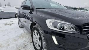 Black Volvo XC60 2014 in Utena, with an engine capacity of 2.40 L and mileage of 200 thousand km for 13650 €, photo 10 on AUTOMOTO.COM.LV