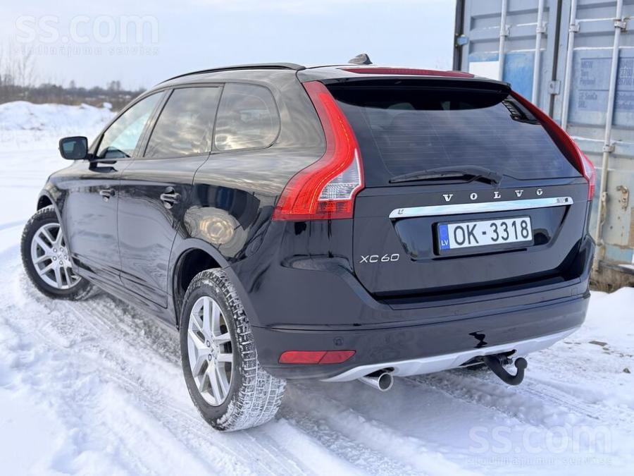 Black Volvo XC60 2014 in Riga, with an engine capacity of 2.00 L and mileage of 268 thousand km for 11995 €, photo 2 on AUTOMOTO.COM.LV