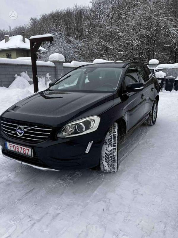 Black Volvo XC60 2014 in Vilnius, with an engine capacity of 1.98 L and mileage of 199 thousand km for 13450 €, photo 1 on AUTOMOTO.COM.LV