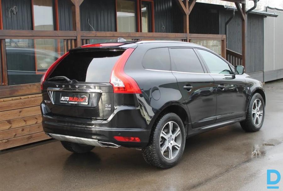 Black Volvo XC60 2014 in Riga, with an engine capacity of 2.40 L and mileage of 105 thousand km for 14750 €, photo 2 on AUTOMOTO.COM.LV