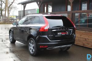 Black Volvo XC60 2014 in Riga, with an engine capacity of 2.40 L and mileage of 105 thousand km for 14750 €, photo 3 on AUTOMOTO.COM.LV