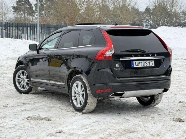 Black Volvo XC60 2014 in Jonava, with an engine capacity of 2.40 L and mileage of 280 thousand km for 13500 €, photo 5 on AUTOMOTO.COM.LV