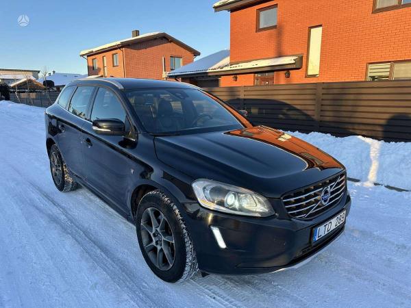 Black Volvo XC60 2014 in Kaunas, with an engine capacity of 1.98 L and mileage of 291 thousand km for 10900 €, photo 1 on AUTOMOTO.COM.LV