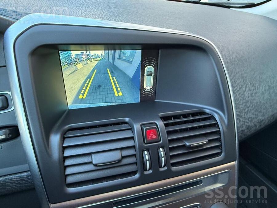 Black Volvo XC60 2014 in Riga, with an engine capacity of 2.40 L and mileage of 269 thousand km for 12500 €, photo 23 on AUTOMOTO.COM.LV