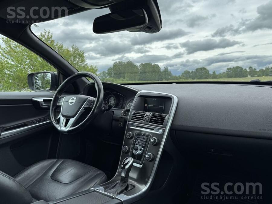 Black Volvo XC60 2014 in Cesis, with an engine capacity of 2.40 L and mileage of 0 thousand km for 11500 €, photo 19 on AUTOMOTO.COM.LV