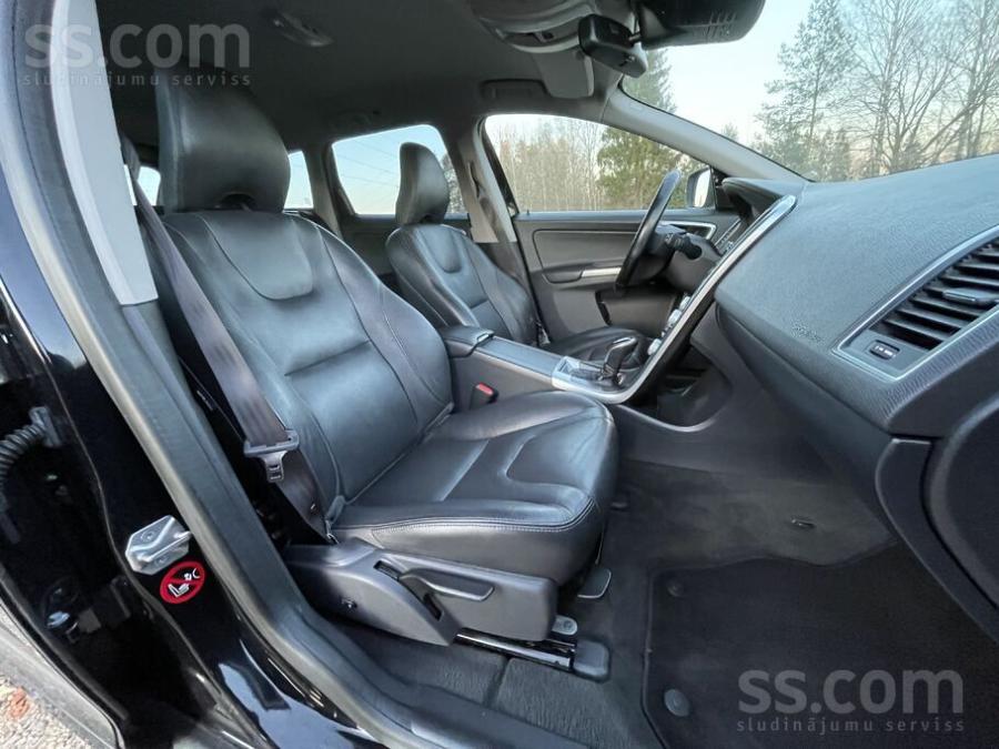 Black Volvo XC60 2014 in Cesis, with an engine capacity of 2.00 L and mileage of 0 thousand km for 10590 €, photo 16 on AUTOMOTO.COM.LV