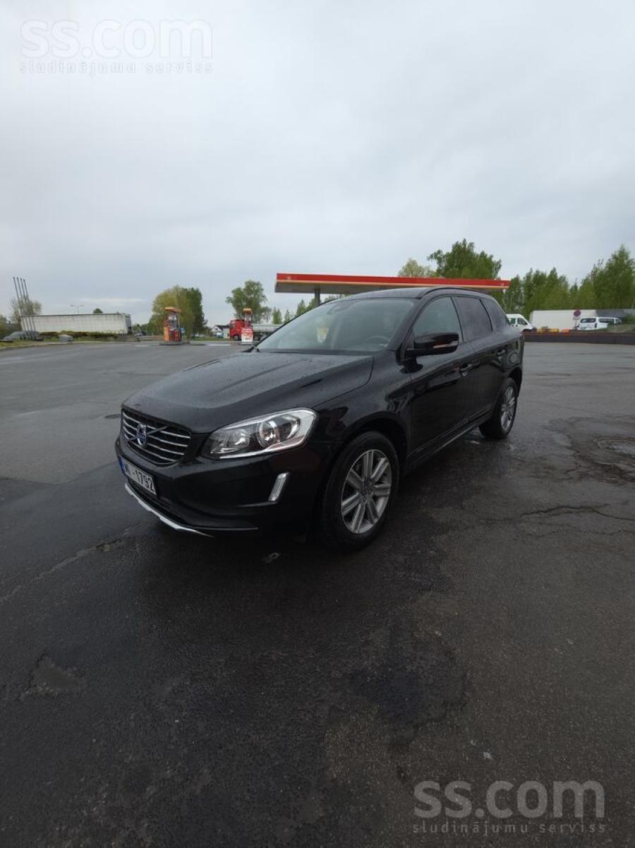 Black Volvo XC60 2014 in Riga, with an engine capacity of 2.00 L and mileage of 256 thousand km for 9450 €, photo 1 on AUTOMOTO.COM.LV
