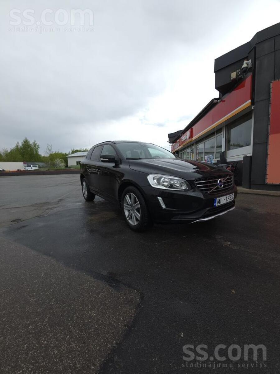 Black Volvo XC60 2014 in Riga, with an engine capacity of 2.00 L and mileage of 256 thousand km for 9450 €, photo 3 on AUTOMOTO.COM.LV