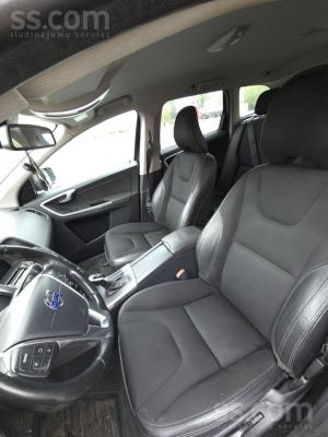 Black Volvo XC60 2014 in Riga, with an engine capacity of 2.00 L and mileage of 256 thousand km for 9450 €, photo 7 on AUTOMOTO.COM.LV