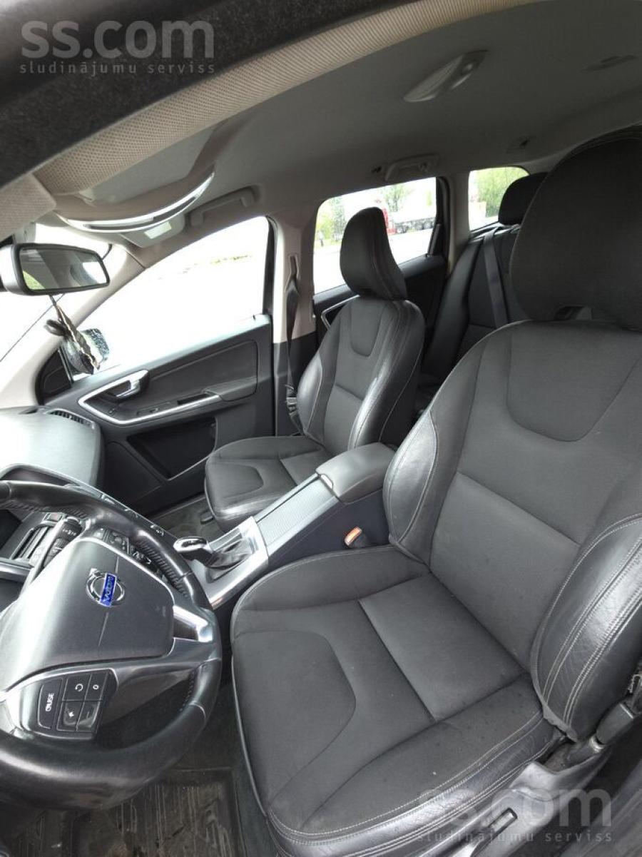 Black Volvo XC60 2014 in Riga, with an engine capacity of 2.00 L and mileage of 256 thousand km for 9450 €, photo 7 on AUTOMOTO.COM.LV