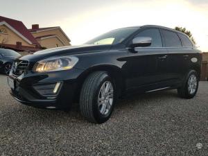 Black Volvo XC60 2014 in Pakruojis, with an engine capacity of 2.40 L and mileage of 253 thousand km for 12599 €, photo 4 on AUTOMOTO.COM.LV