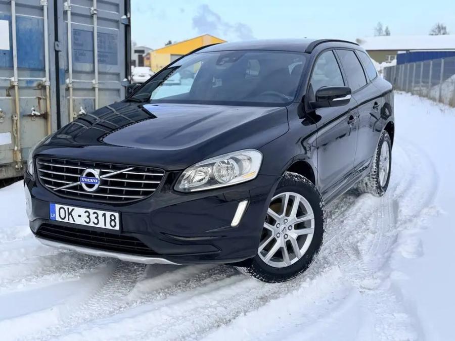 Black Volvo XC60 2014 in Riga, with an engine capacity of 2.00 L and mileage of 268 thousand km for 11995 €, photo 4 on AUTOMOTO.COM.LV