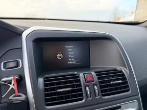 Black Volvo XC60 2014 in Riga, with an engine capacity of 2.00 L and mileage of 268 thousand km for 11995 €, photo 21 on AUTOMOTO.COM.LV