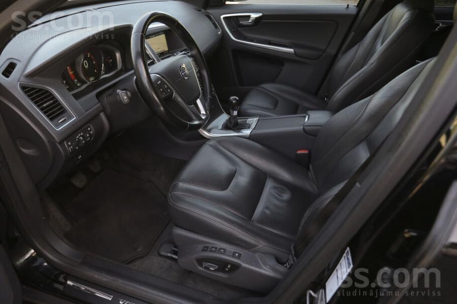 Black Volvo XC60 2014 in Riga, with an engine capacity of 2.40 L and mileage of 248 thousand km for 9990 €, photo 8 on AUTOMOTO.COM.LV