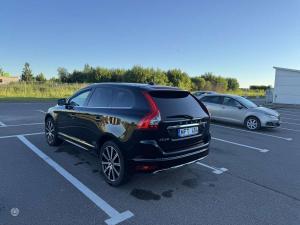 Black Volvo XC60 2014 in Panevezys, with an engine capacity of 2.40 L and mileage of 306 thousand km for 14500 €, photo 6 on AUTOMOTO.COM.LV