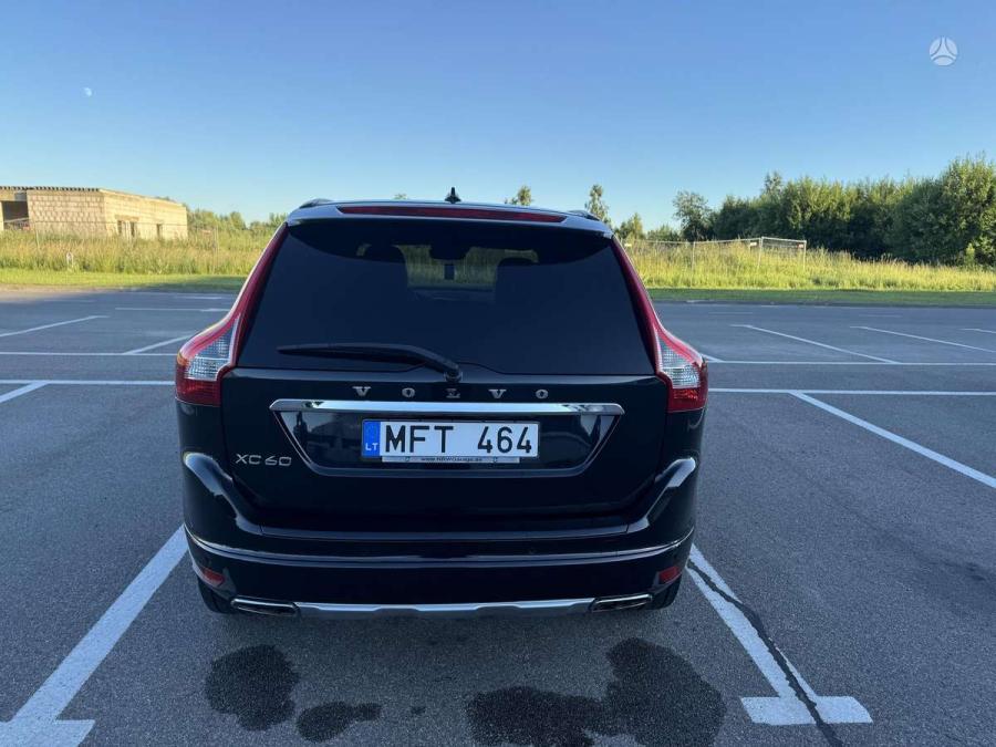Black Volvo XC60 2014 in Panevezys, with an engine capacity of 2.40 L and mileage of 306 thousand km for 14500 €, photo 7 on AUTOMOTO.COM.LV
