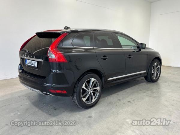 Black Volvo XC60 2014 in Tallinn, with an engine capacity of 2.00 L and mileage of 285 thousand km for 10999 €, photo 5 on AUTOMOTO.COM.LV