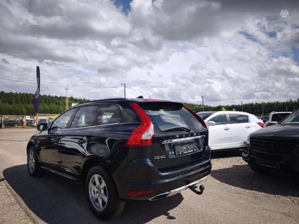 Black Volvo XC60 2014 in Vilnius, with an engine capacity of 2.40 L and mileage of 223 thousand km for 12450 €, photo 6 on AUTOMOTO.COM.LV