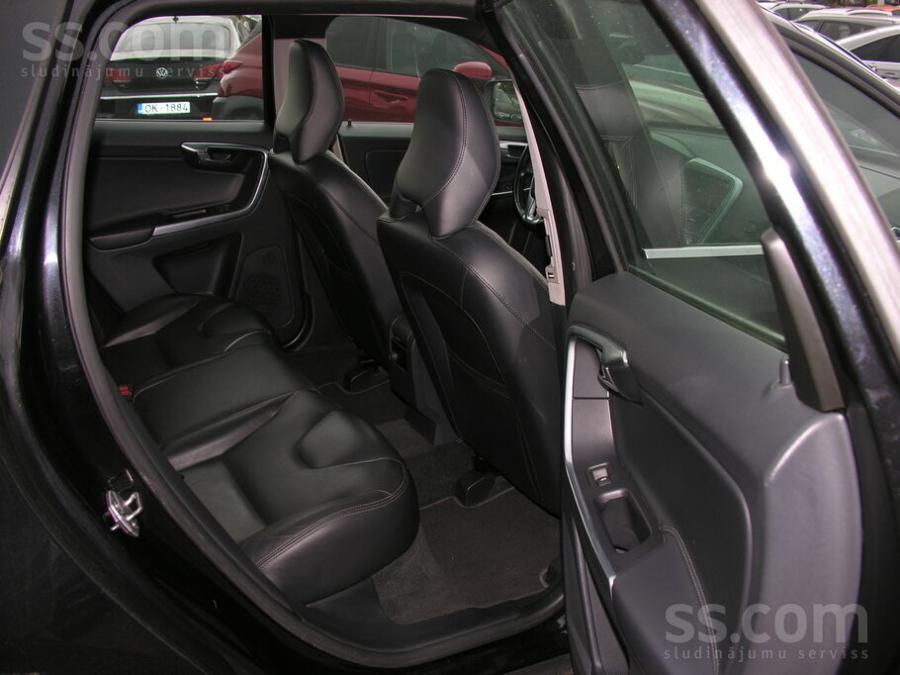 Black Volvo XC60 2014 in Riga, with an engine capacity of 2.00 L and mileage of 220 thousand km for 10990 €, photo 8 on AUTOMOTO.COM.LV