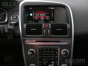 Black Volvo XC60 2014 in Riga, with an engine capacity of 2.00 L and mileage of 220 thousand km for 10990 €, photo 13 on AUTOMOTO.COM.LV