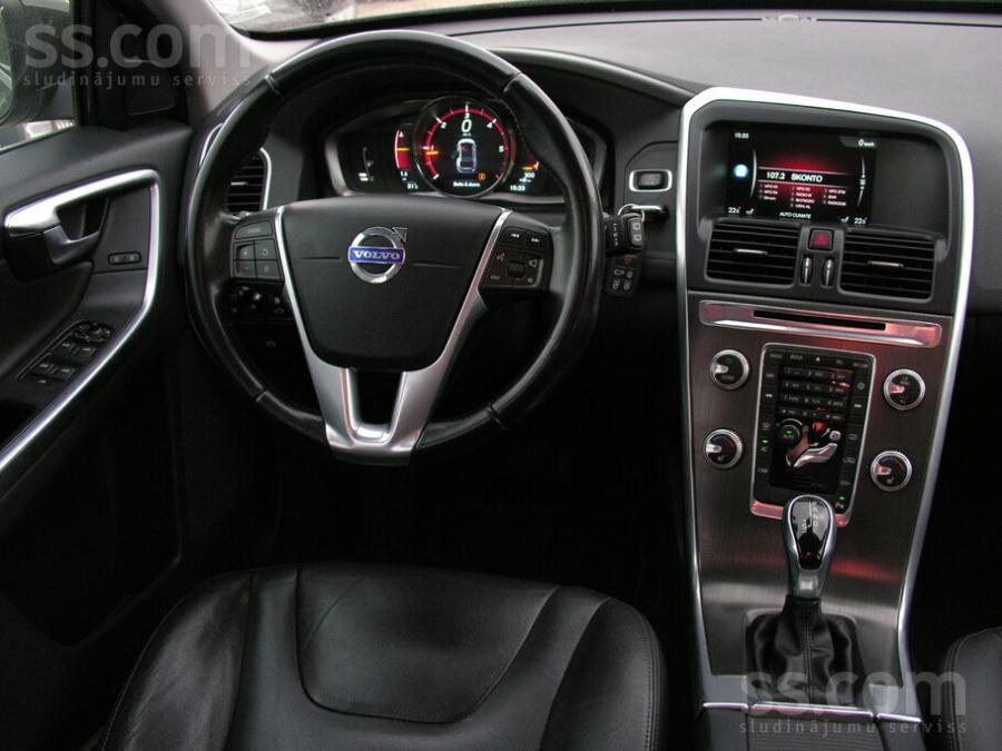 Black Volvo XC60 2014 in Riga, with an engine capacity of 2.00 L and mileage of 220 thousand km for 10990 €, photo 16 on AUTOMOTO.COM.LV