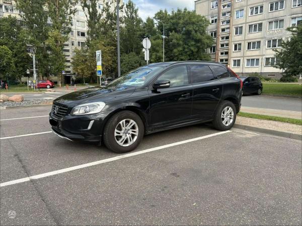Black Volvo XC60 2014 in Vilnius, with an engine capacity of 2.40 L and mileage of 330 thousand km for 8999 €, photo 1 on AUTOMOTO.COM.LV