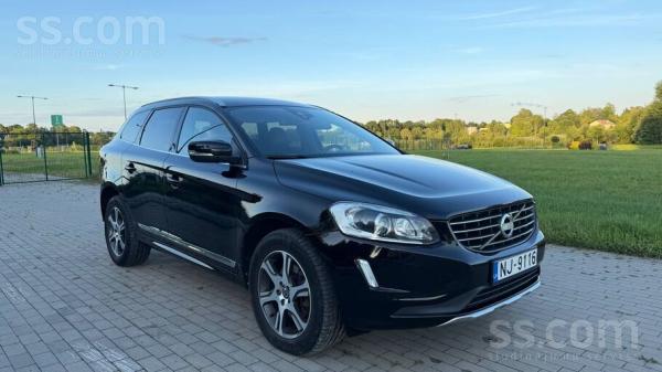 Black Volvo XC60 2014 in Rezekne, with an engine capacity of 2.00 L and mileage of 217 thousand km for 7999 €, photo 2 on AUTOMOTO.COM.LV
