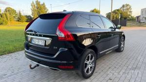 Black Volvo XC60 2014 in Rezekne, with an engine capacity of 2.00 L and mileage of 217 thousand km for 7999 €, photo 4 on AUTOMOTO.COM.LV