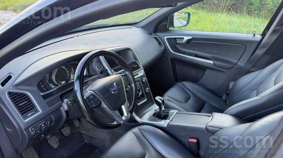 Black Volvo XC60 2014 in Rezekne, with an engine capacity of 2.00 L and mileage of 217 thousand km for 7999 €, photo 8 on AUTOMOTO.COM.LV