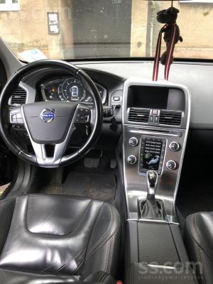 Black Volvo XC60 2014 in Riga, with an engine capacity of 2.00 L and mileage of 213 thousand km for 9600 €, photo 10 on AUTOMOTO.COM.LV