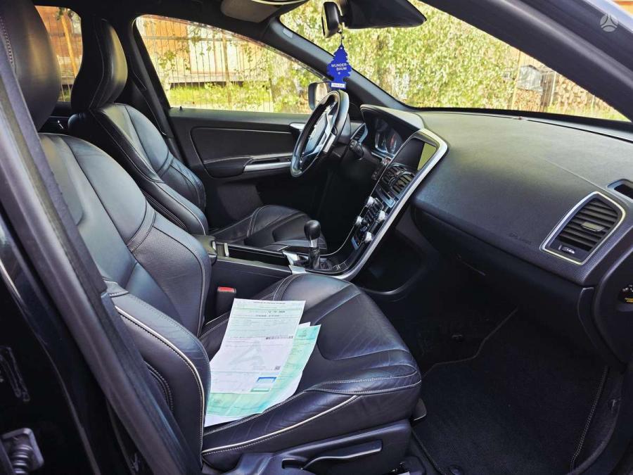 Black Volvo XC60 2014 in Ukmerge, with an engine capacity of 1.98 L and mileage of 295 thousand km for 9250 €, photo 14 on AUTOMOTO.COM.LV