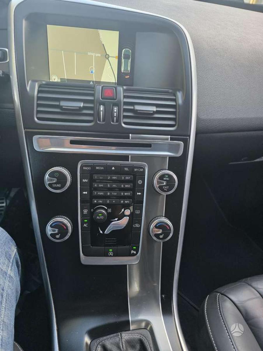 Black Volvo XC60 2014 in Ukmerge, with an engine capacity of 1.98 L and mileage of 295 thousand km for 9250 €, photo 17 on AUTOMOTO.COM.LV