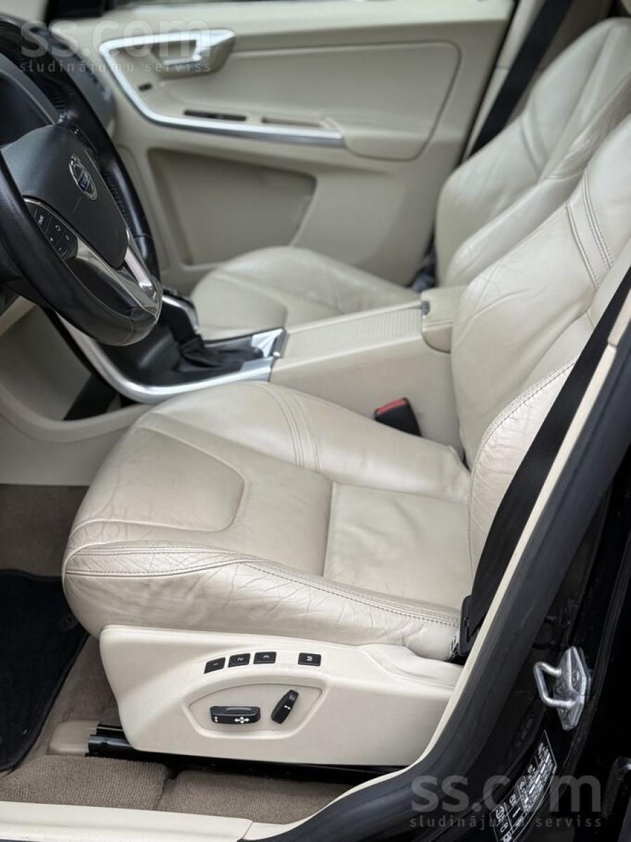 Black Volvo XC60 2014 in Riga, with an engine capacity of 2.40 L and mileage of 0 thousand km for 11900 €, photo 7 on AUTOMOTO.COM.LV