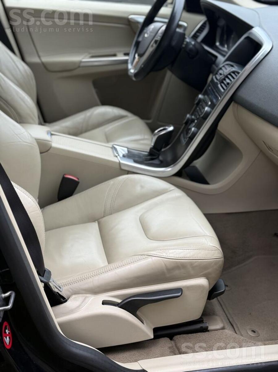Black Volvo XC60 2014 in Riga, with an engine capacity of 2.40 L and mileage of 0 thousand km for 11900 €, photo 8 on AUTOMOTO.COM.LV