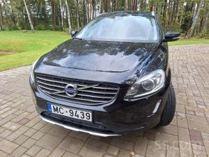 Black Volvo XC60 2014 in Riga, with an engine capacity of 2.40 L and mileage of 272 thousand km for 9450 €, photo  on AUTOMOTO.COM.LV