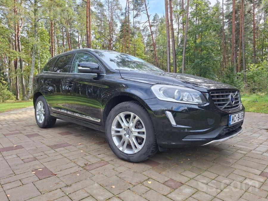 Black Volvo XC60 2014 in Riga, with an engine capacity of 2.40 L and mileage of 272 thousand km for 9450 €, photo 4 on AUTOMOTO.COM.LV