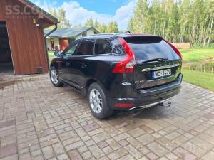 Black Volvo XC60 2014 in Riga, with an engine capacity of 2.40 L and mileage of 272 thousand km for 9450 €, photo 8 on AUTOMOTO.COM.LV
