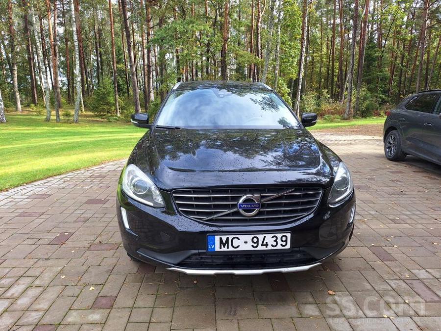 Black Volvo XC60 2014 in Riga, with an engine capacity of 2.40 L and mileage of 272 thousand km for 9450 €, photo 13 on AUTOMOTO.COM.LV